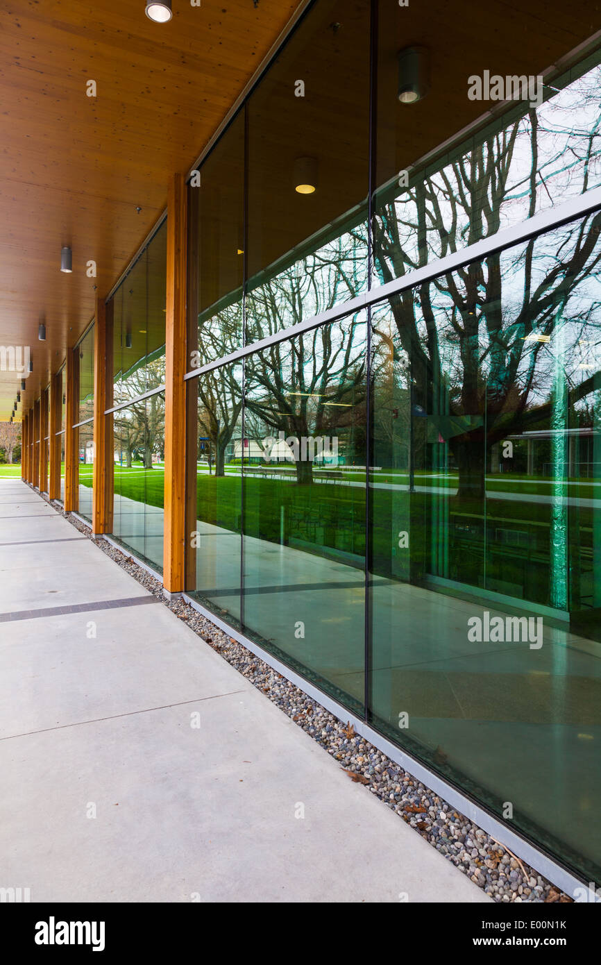 Reflective wall of glass panels on the campus of UBC, Vancouver, Canada ...