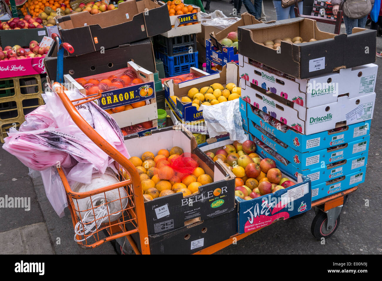 Boxes of fresh produce on a trolley at a local market in London Stock ...