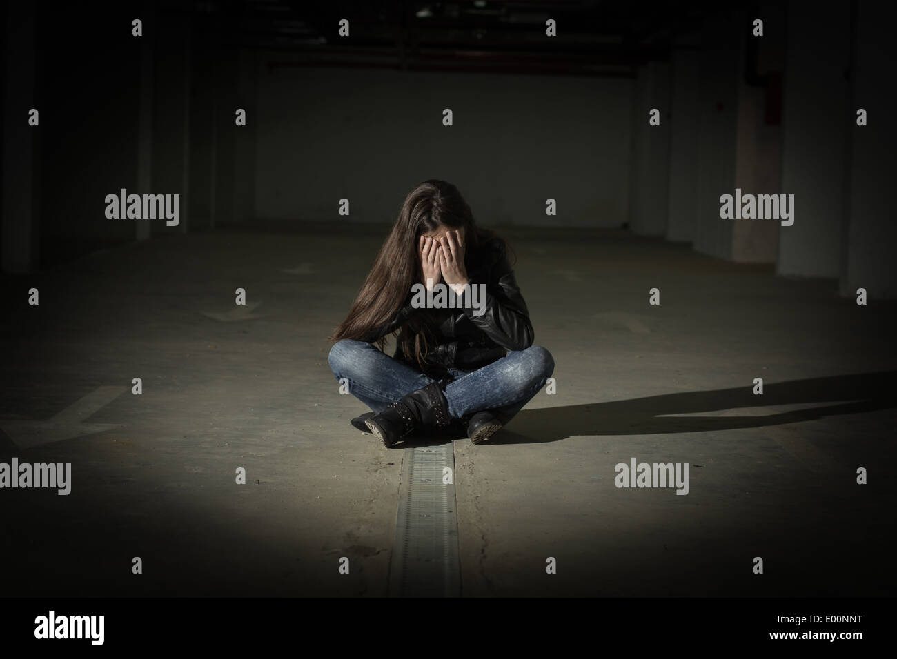 Depressed teenage girl with hands over face Stock Photo - Alamy