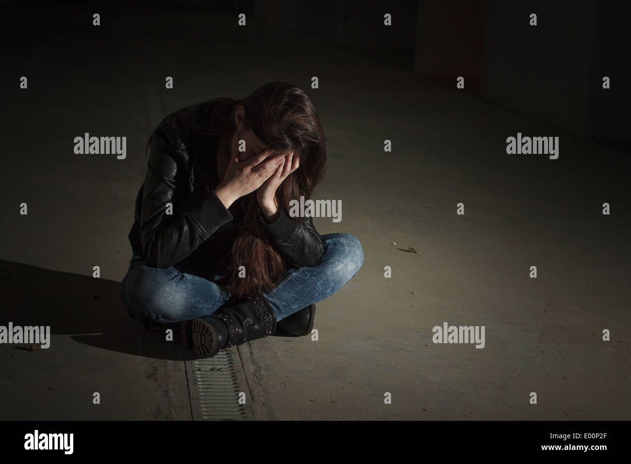 Depressed teenage girl with hands over face Stock Photo - Alamy