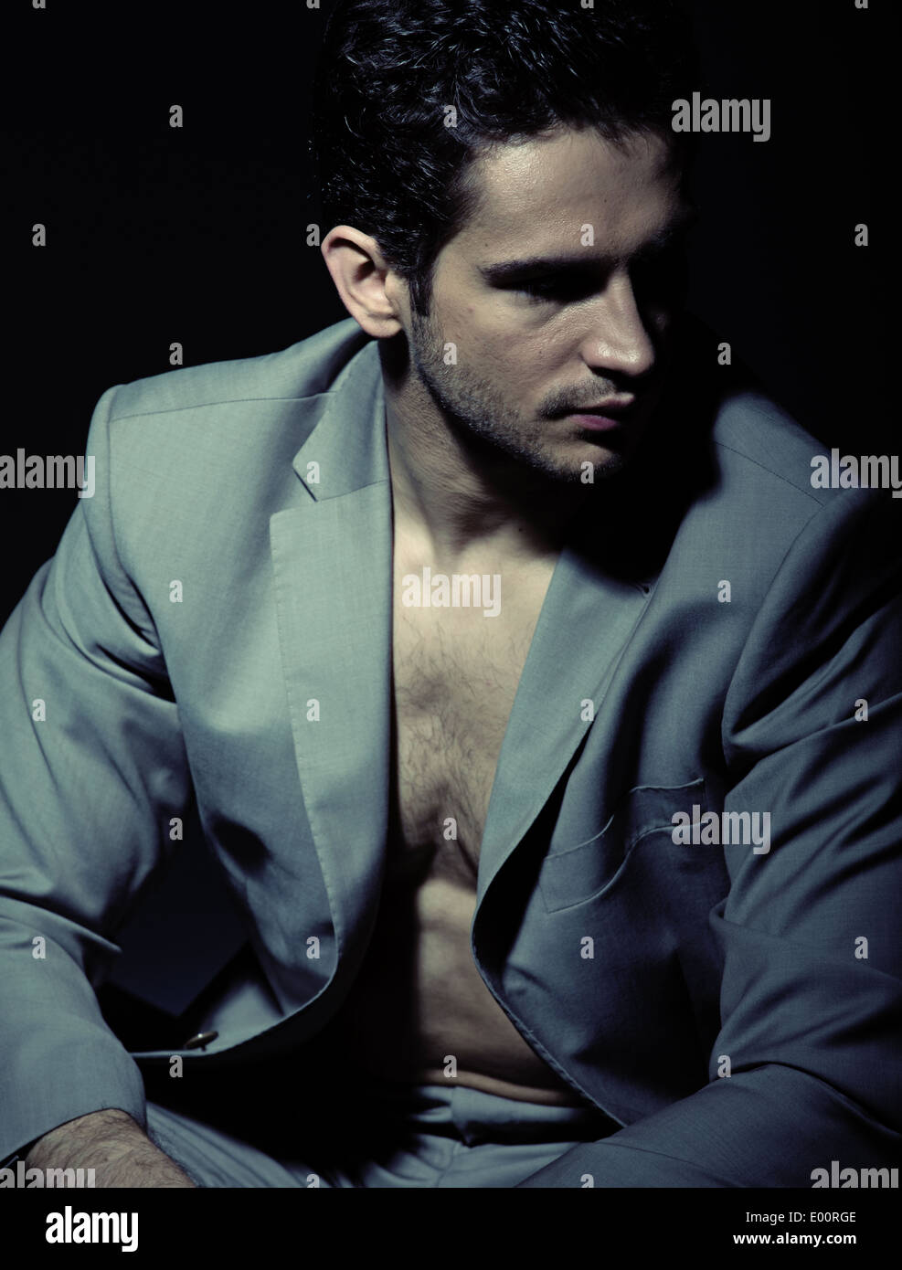 Serious muscular guy wearing suit hi-res stock photography and images ...