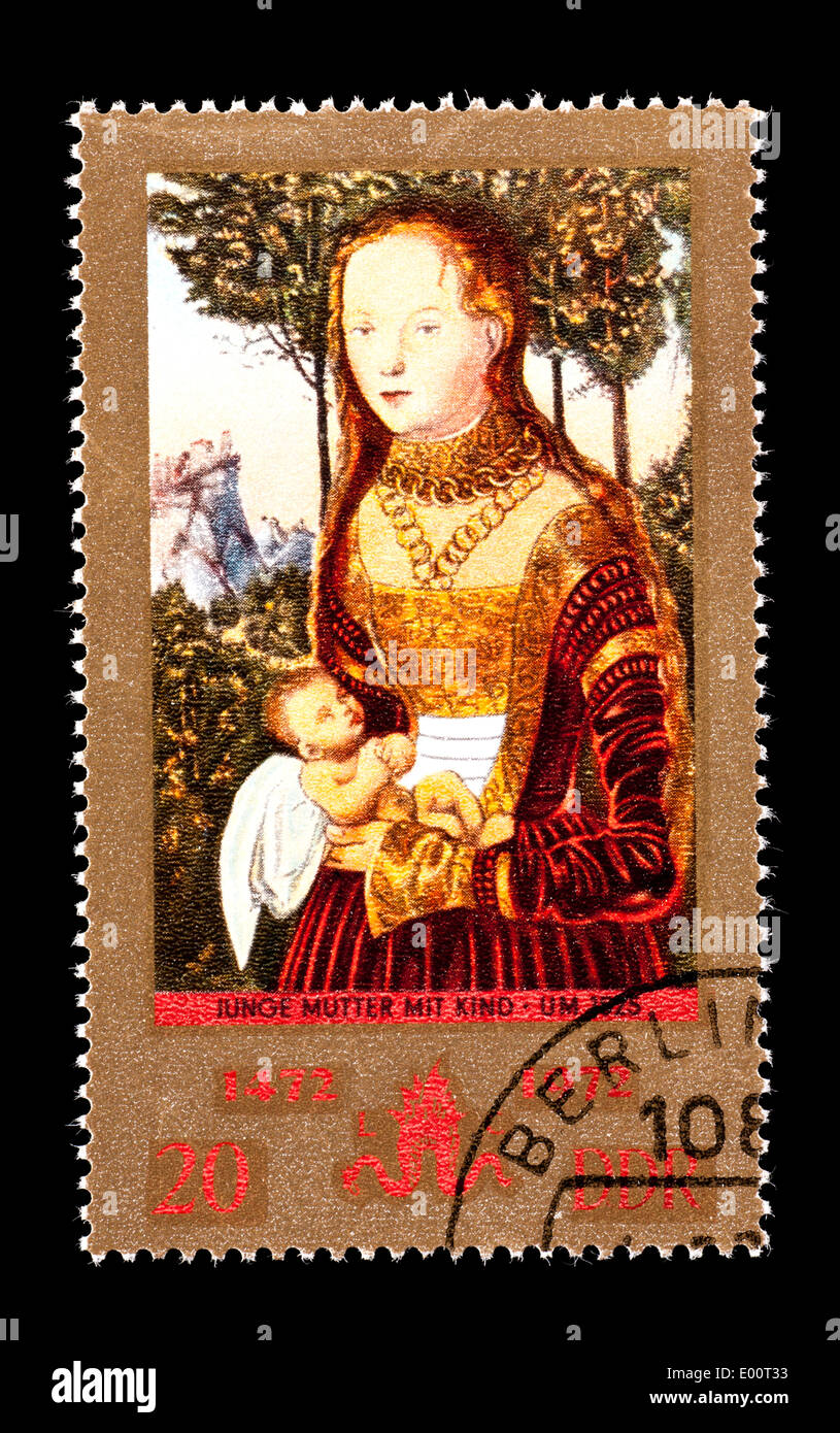 Postage stamp from East Germany depicting the Lucas Cranach painting "Young Mother and Child ...