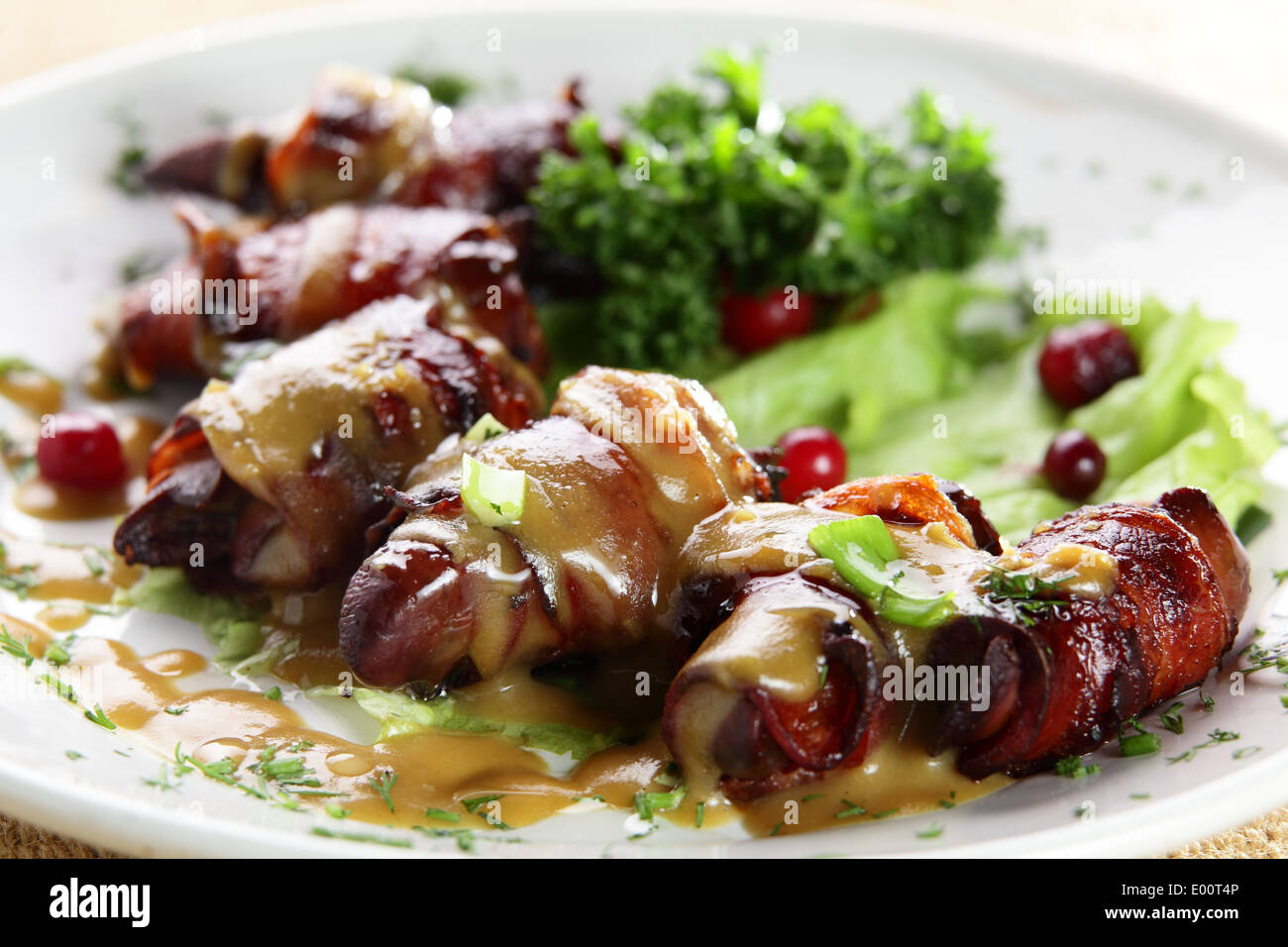 hot roasted meat on white dish with onion Stock Photo - Alamy