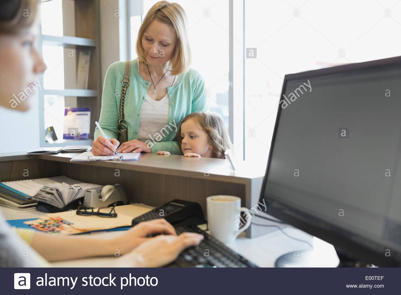 Child parent paperwork hi-res stock photography and images - Alamy