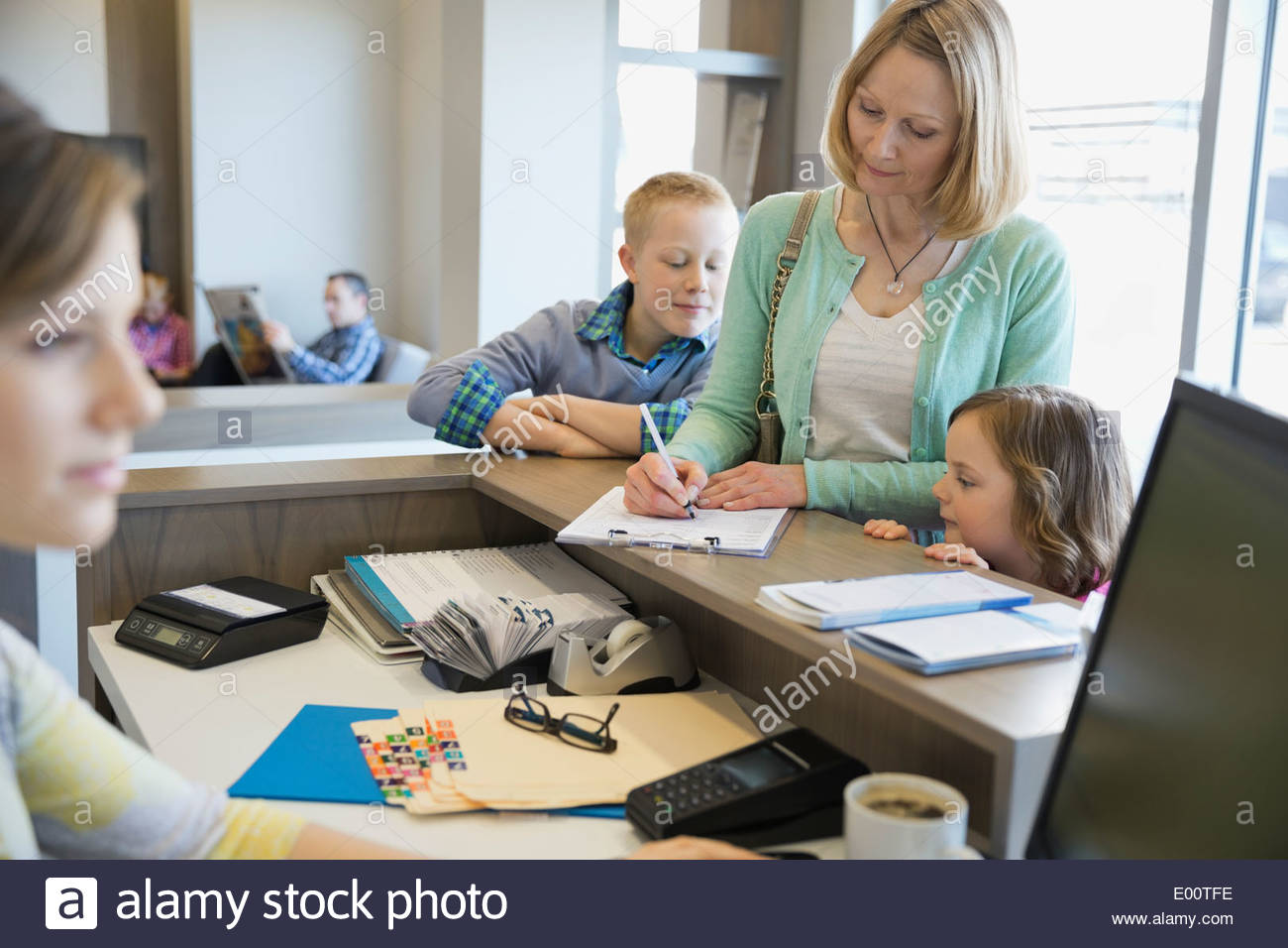 Child parent paperwork hi-res stock photography and images - Alamy