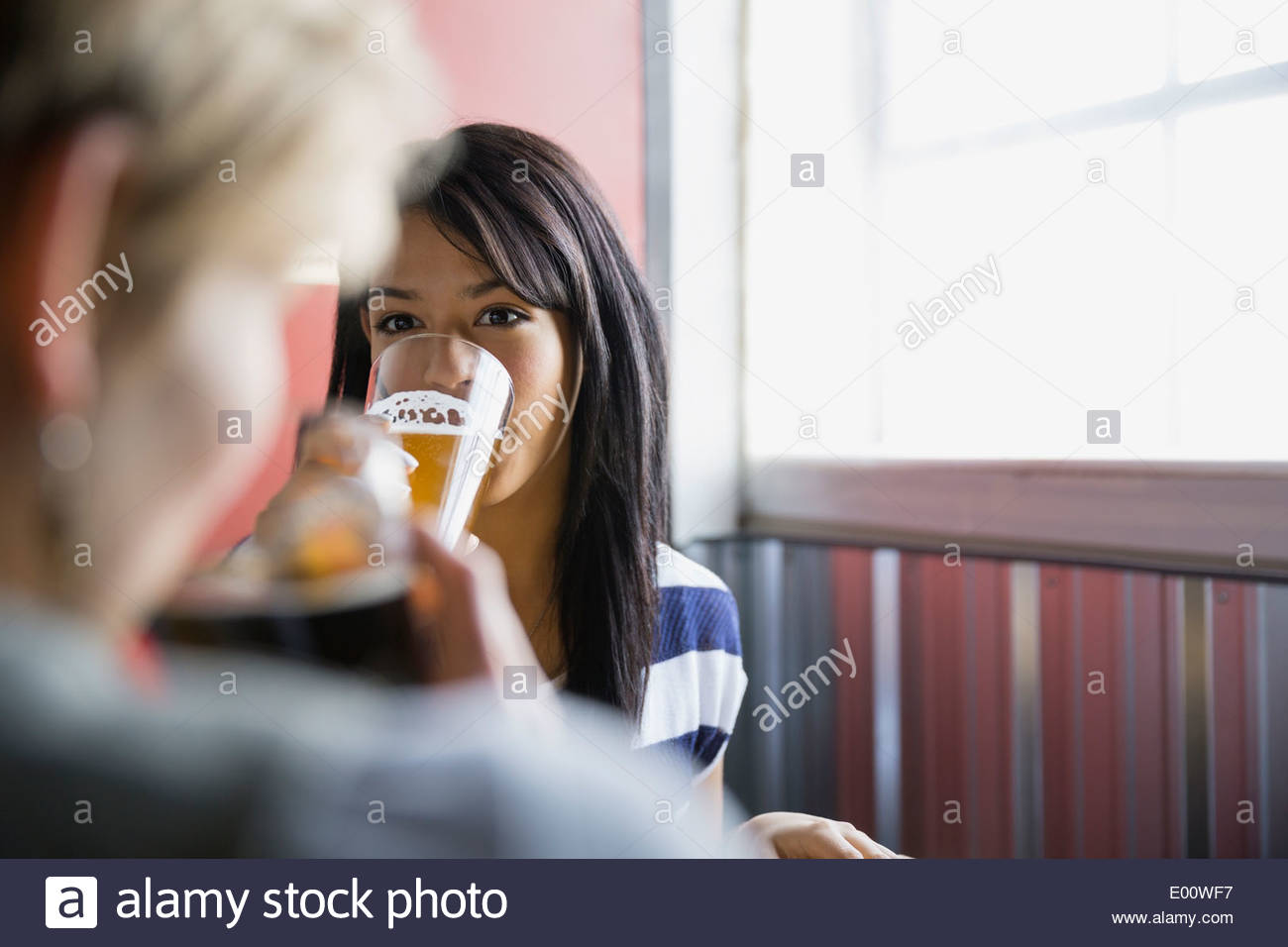 Women drinking beer hi-res stock photography and images - Alamy