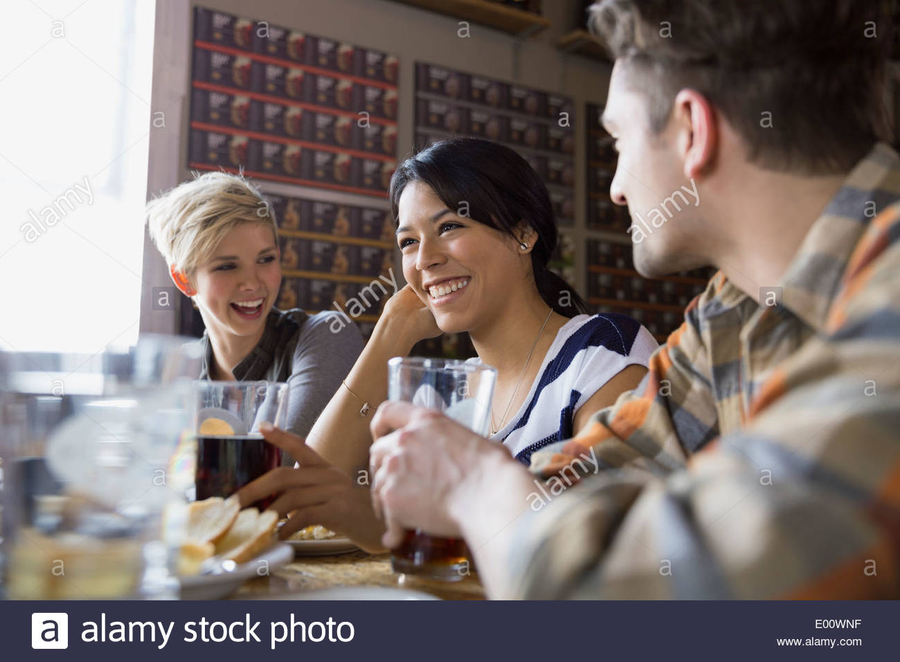 Man laughing with friends hi-res stock photography and images - Alamy