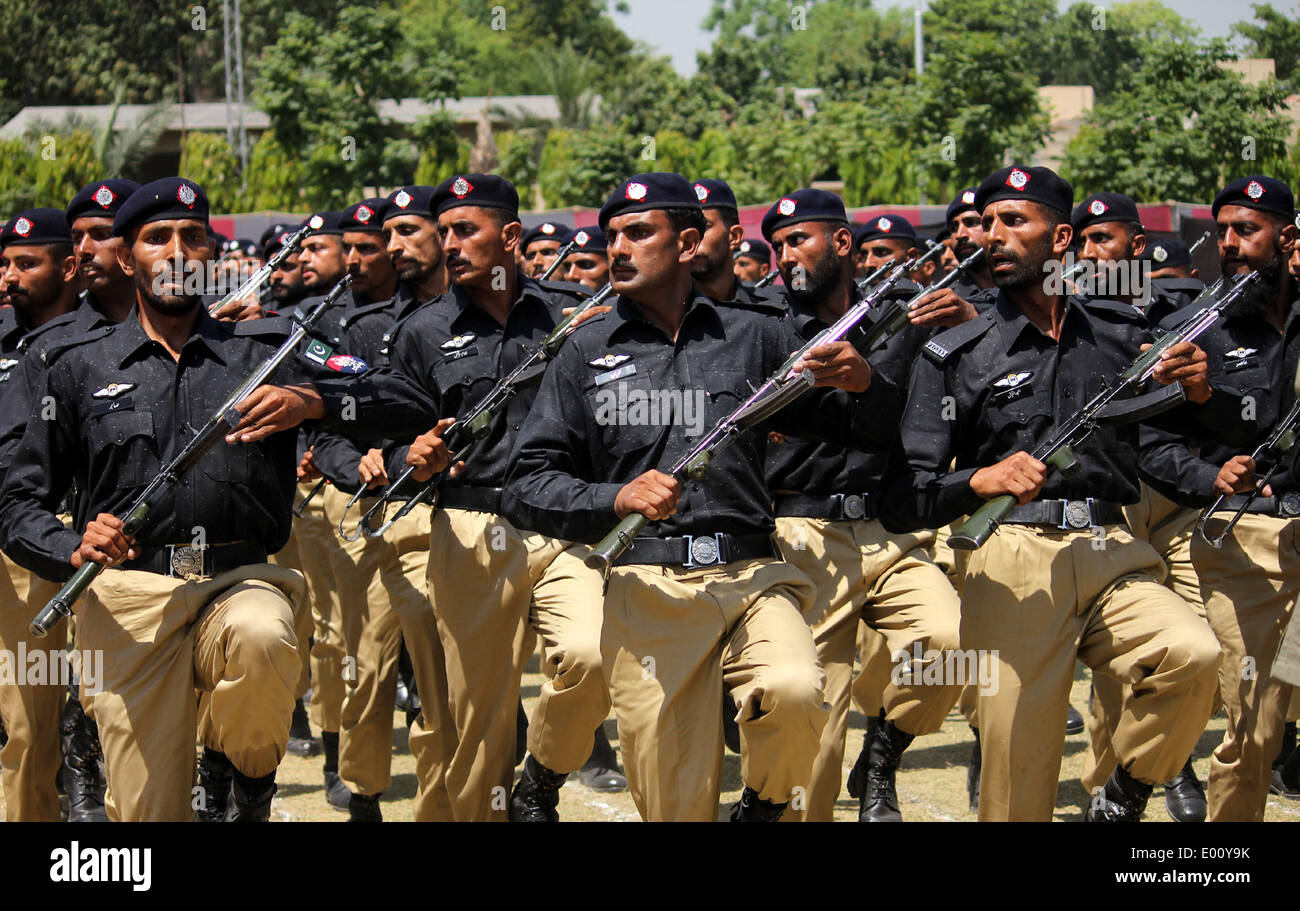 Lahore. 28th Apr, 2014. Police commandos march during a passing out ...