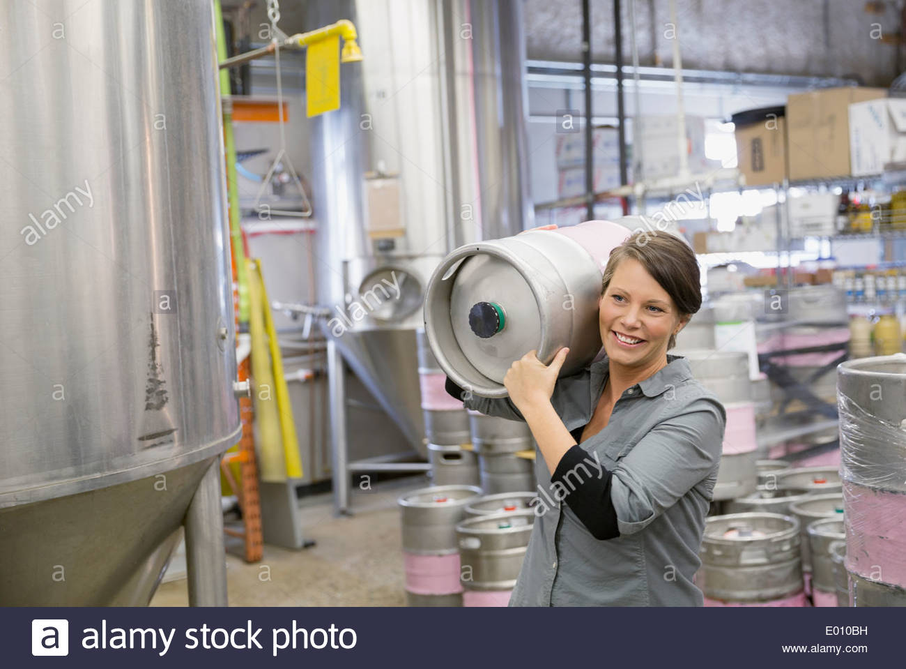 Woman carrying beer hi-res stock photography and images - Alamy
