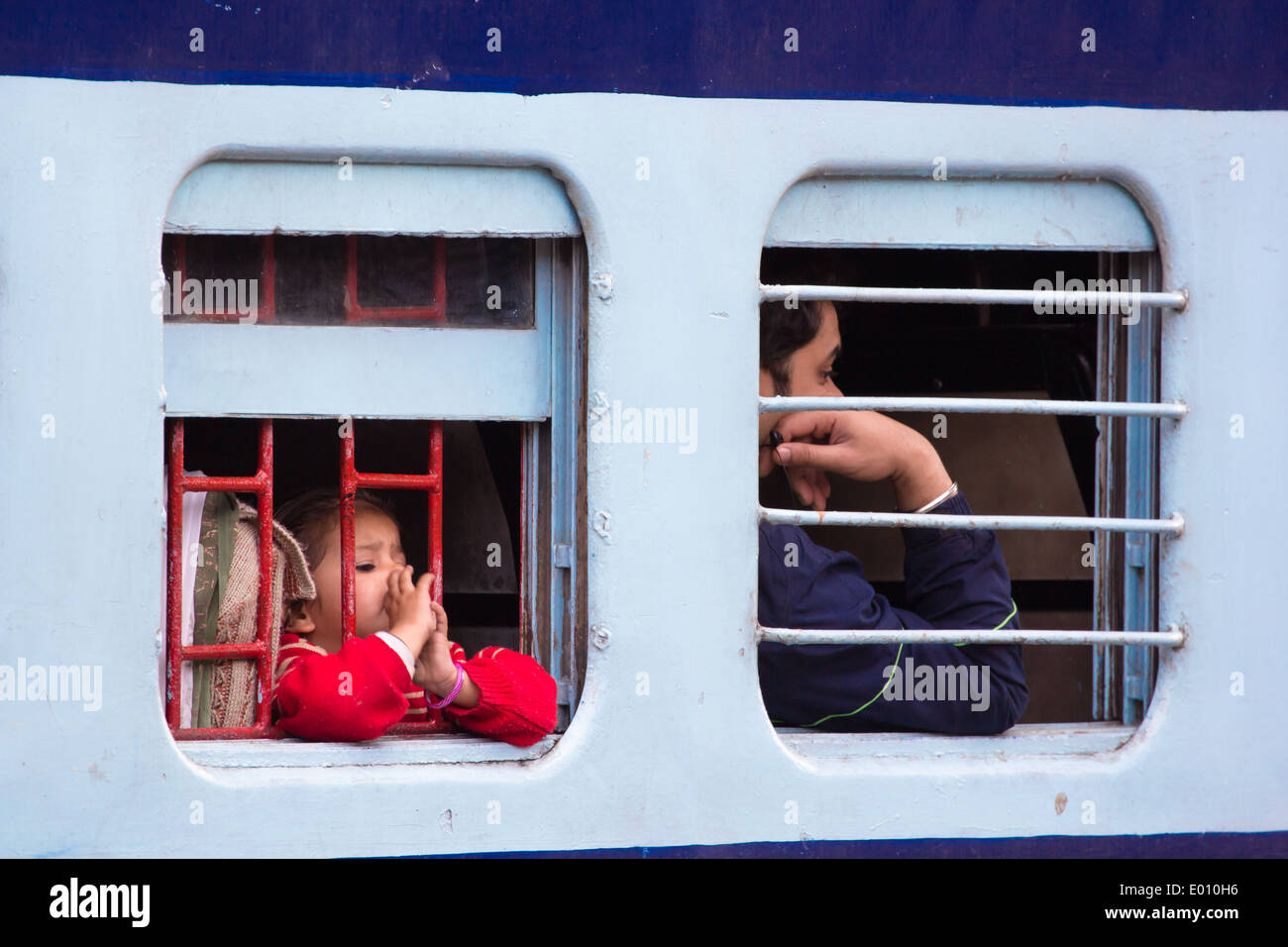 Indian people waiting for train moving out from train station Stock ...