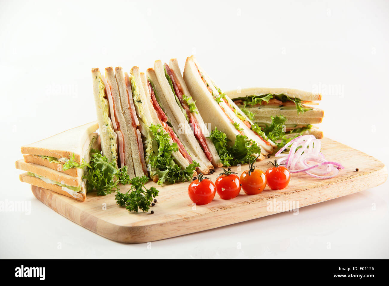fresh sandwiches on wooden desk and white background Stock Photo - Alamy