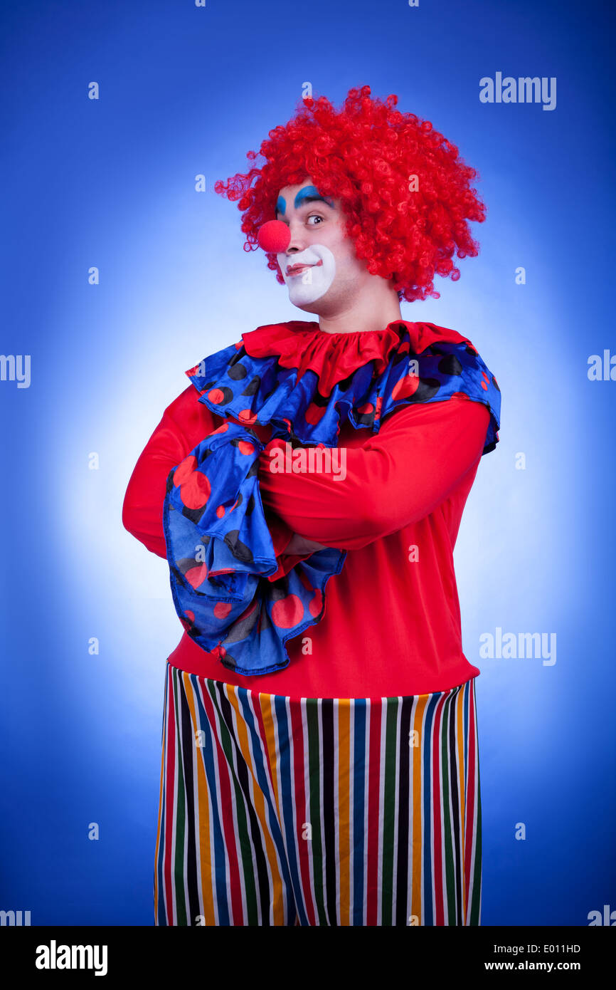 Clown men on blue background. Studio shooting professional lights Stock ...