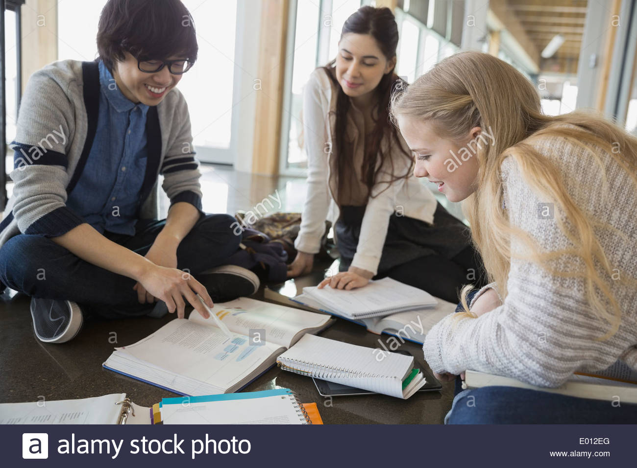 School teenage ethnic books hi-res stock photography and images - Alamy