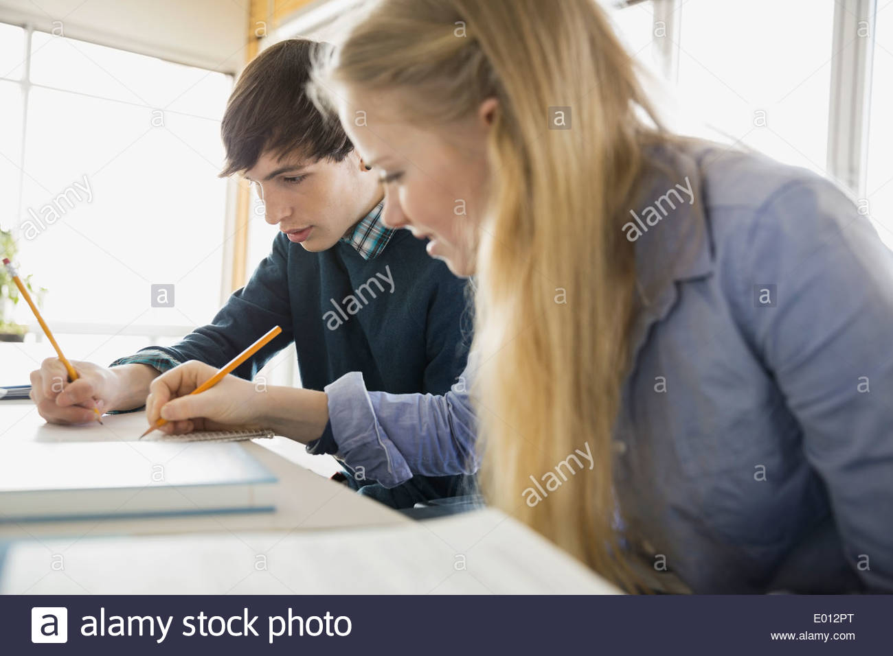 High school students problem solving in classroom Stock Photo - Alamy