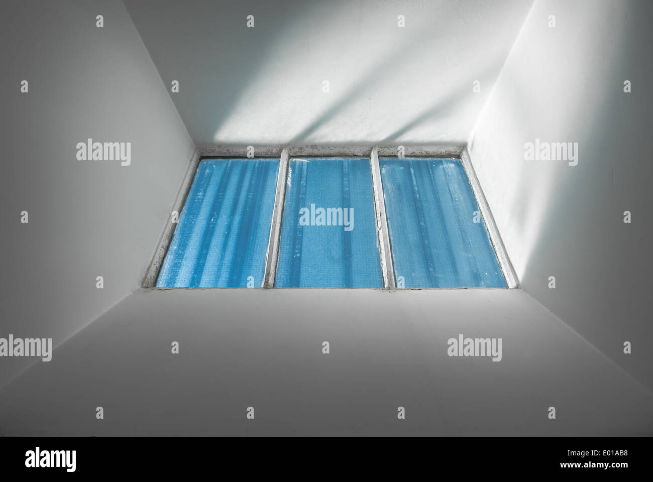 An old stained window skylight in a derelict building Stock Photo - Alamy