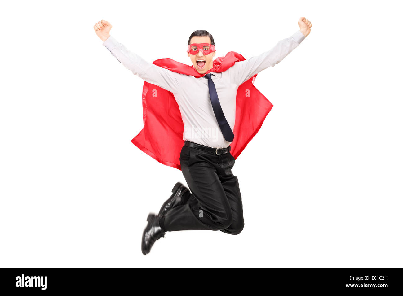 Male superhero jumping out of happiness Stock Photo - Alamy