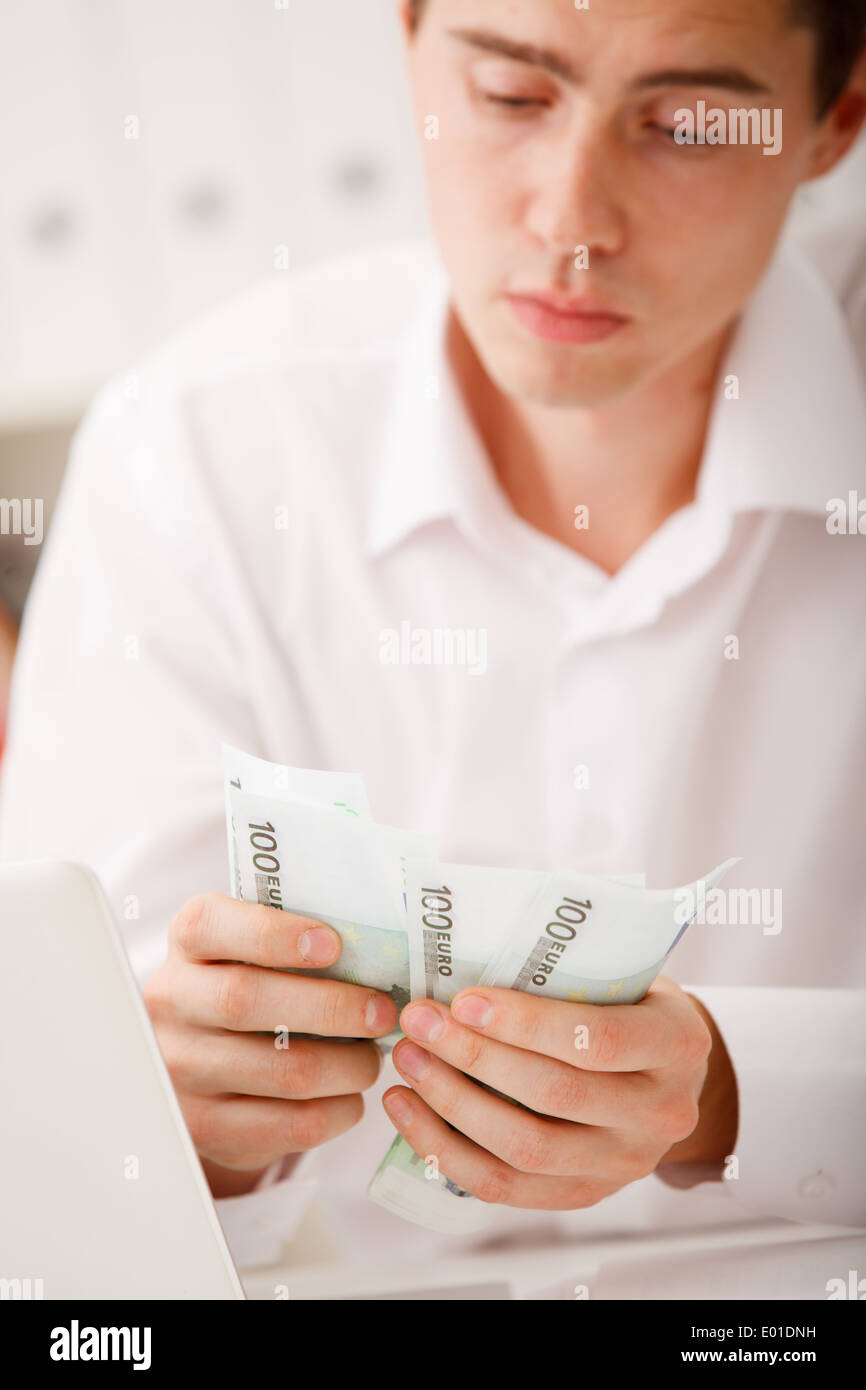 man counting money Stock Photo - Alamy