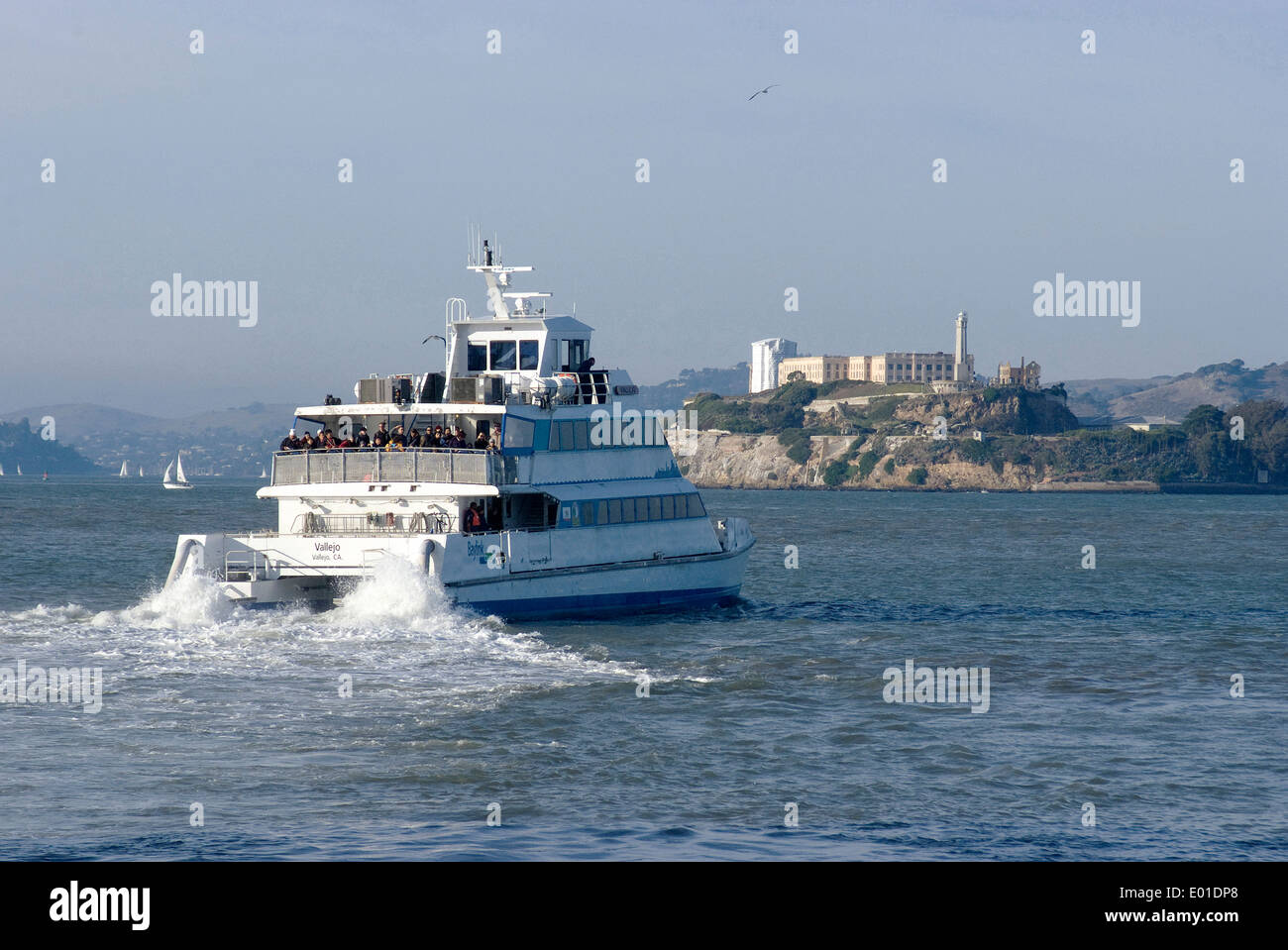 Tourist ship heading out into the bay and Alcatraz Island, San ...