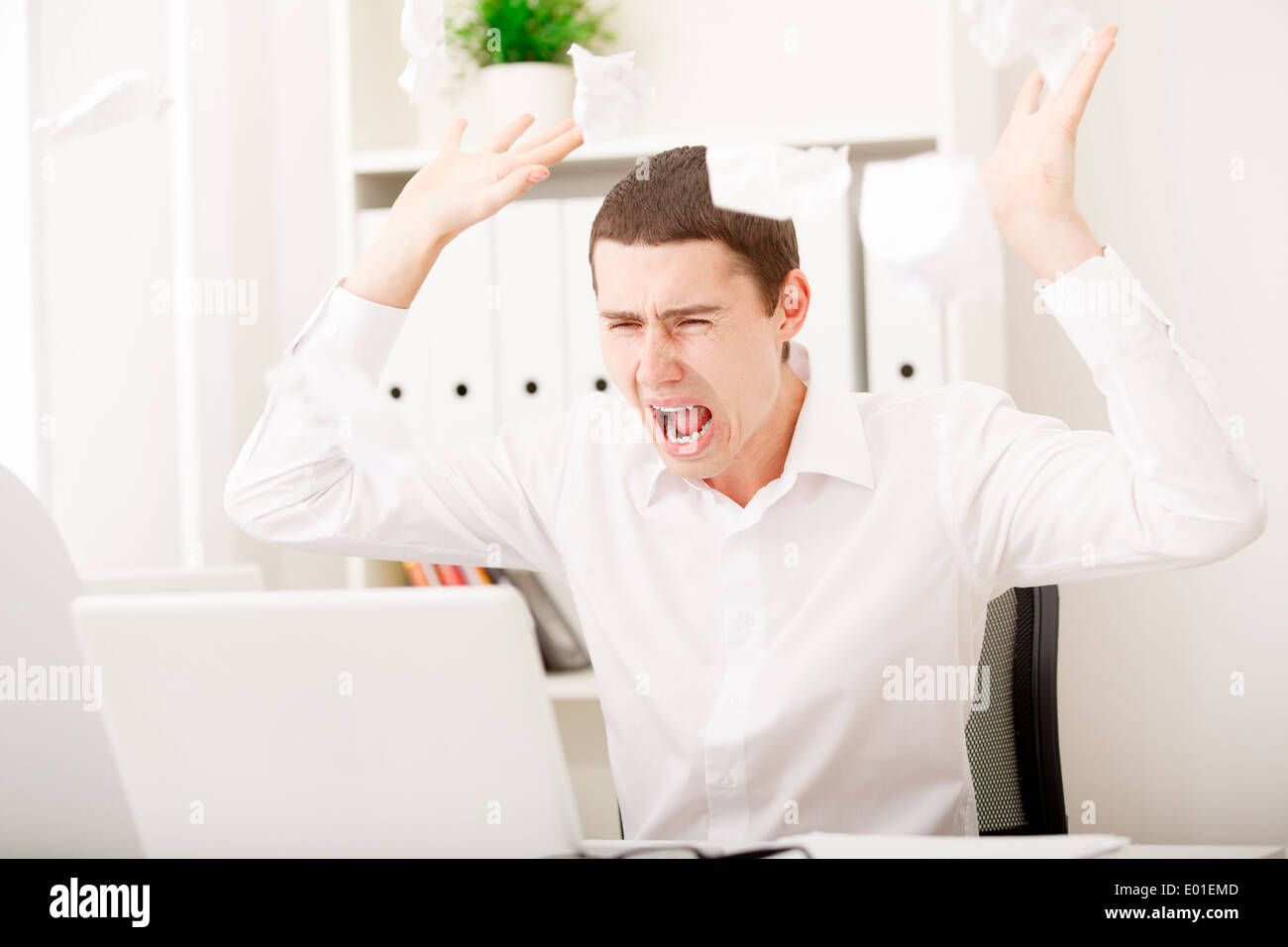 Desperate insane corporate businessman hi-res stock photography and ...
