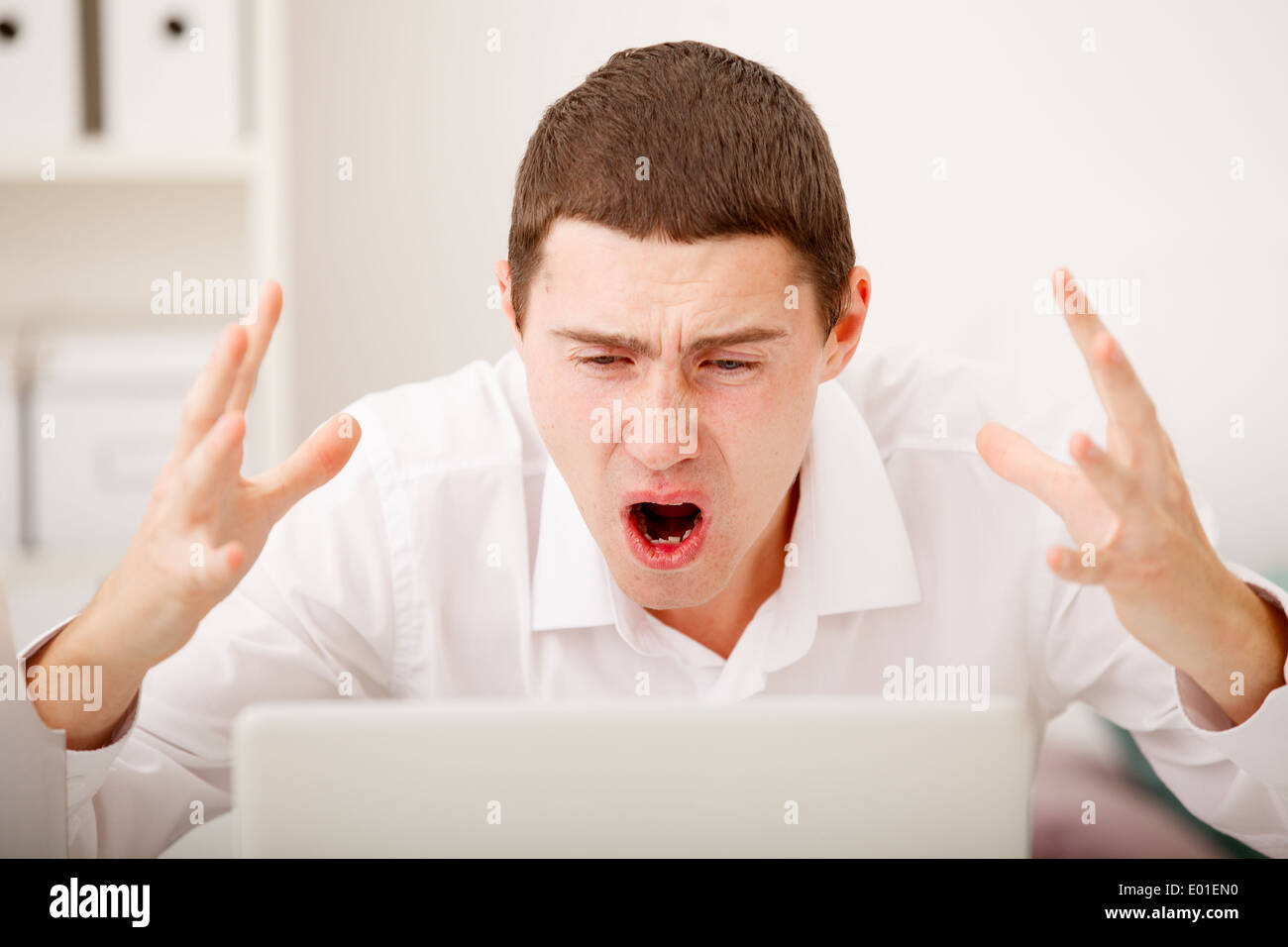 Angry man screaming Stock Photo - Alamy