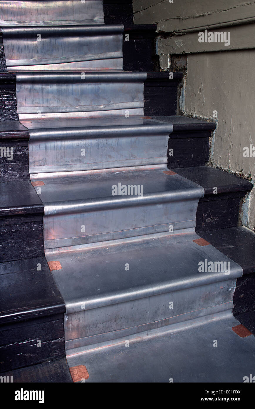 Stair detail, showing the Lead and Copper stair runner Stock Photo - Alamy