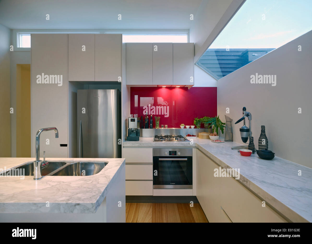 Modern kitchen with white fitted units, Eastbourne St, Melbourne Stock ...