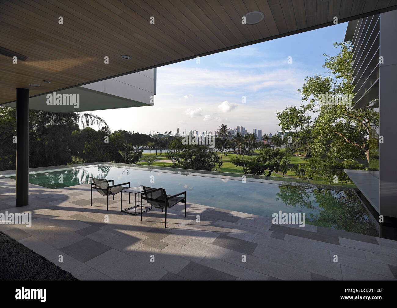 Seating beside swimming pool, Lakeshore View, Sentosa Cove, Singapore ...