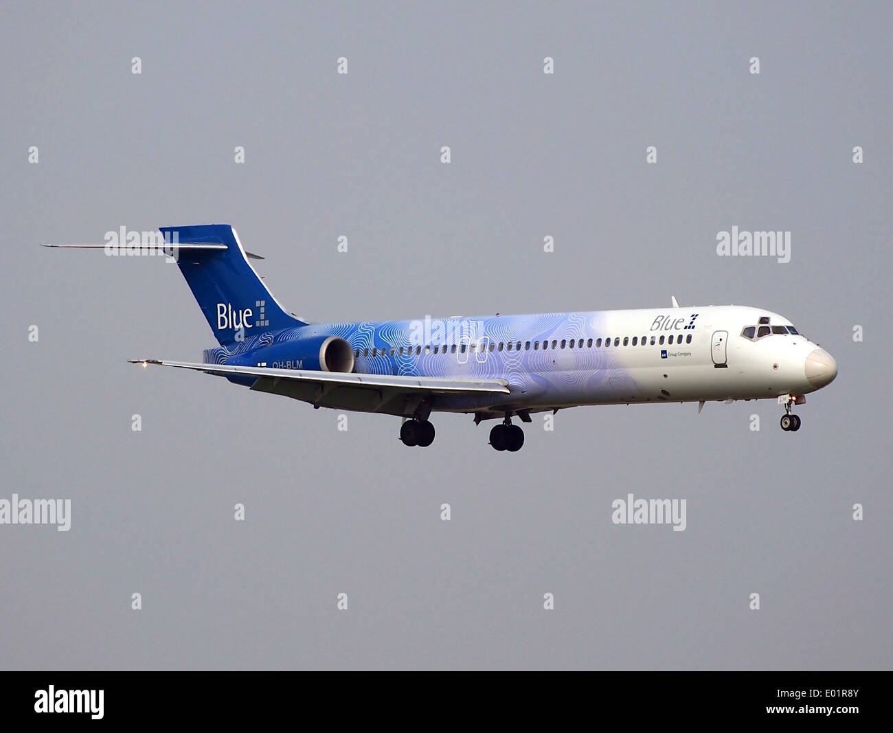 OH-BLM is a Blue1 Boeing 717-23S aircraft captured landing at Schiphol ...