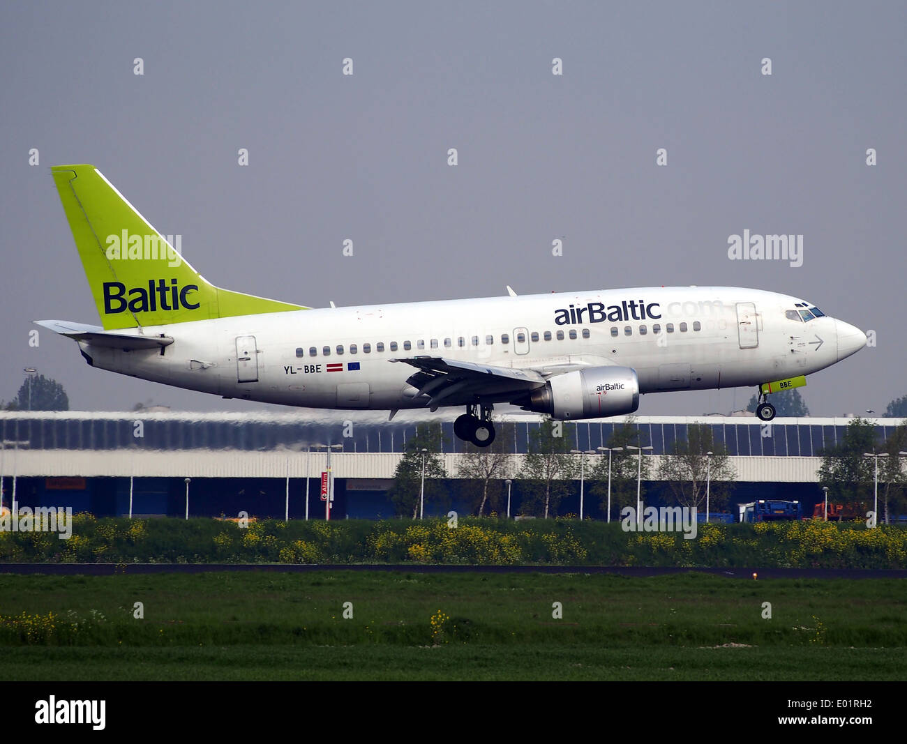 YL-BBE is a Boeing 737-53S operated by Air Baltic, landing at Schiphol ...