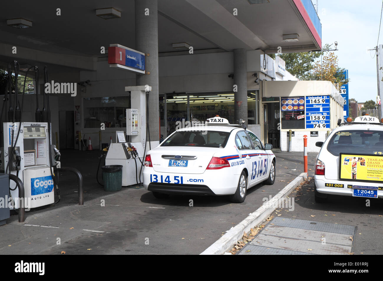 sydney taxi filling up with fuel LPG at a fuel gas station in ...