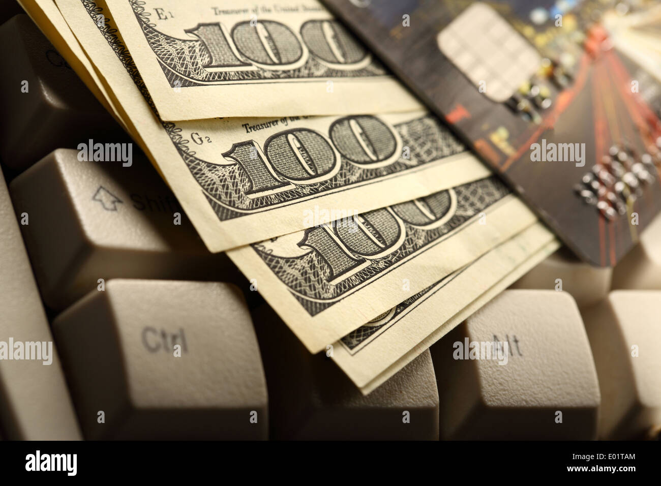 Computer keyboard, credit cards and dollars in cash Stock Photo - Alamy