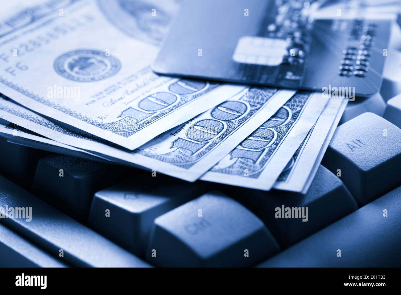 Computer keyboard, credit cards and dollars in cash Stock Photo - Alamy