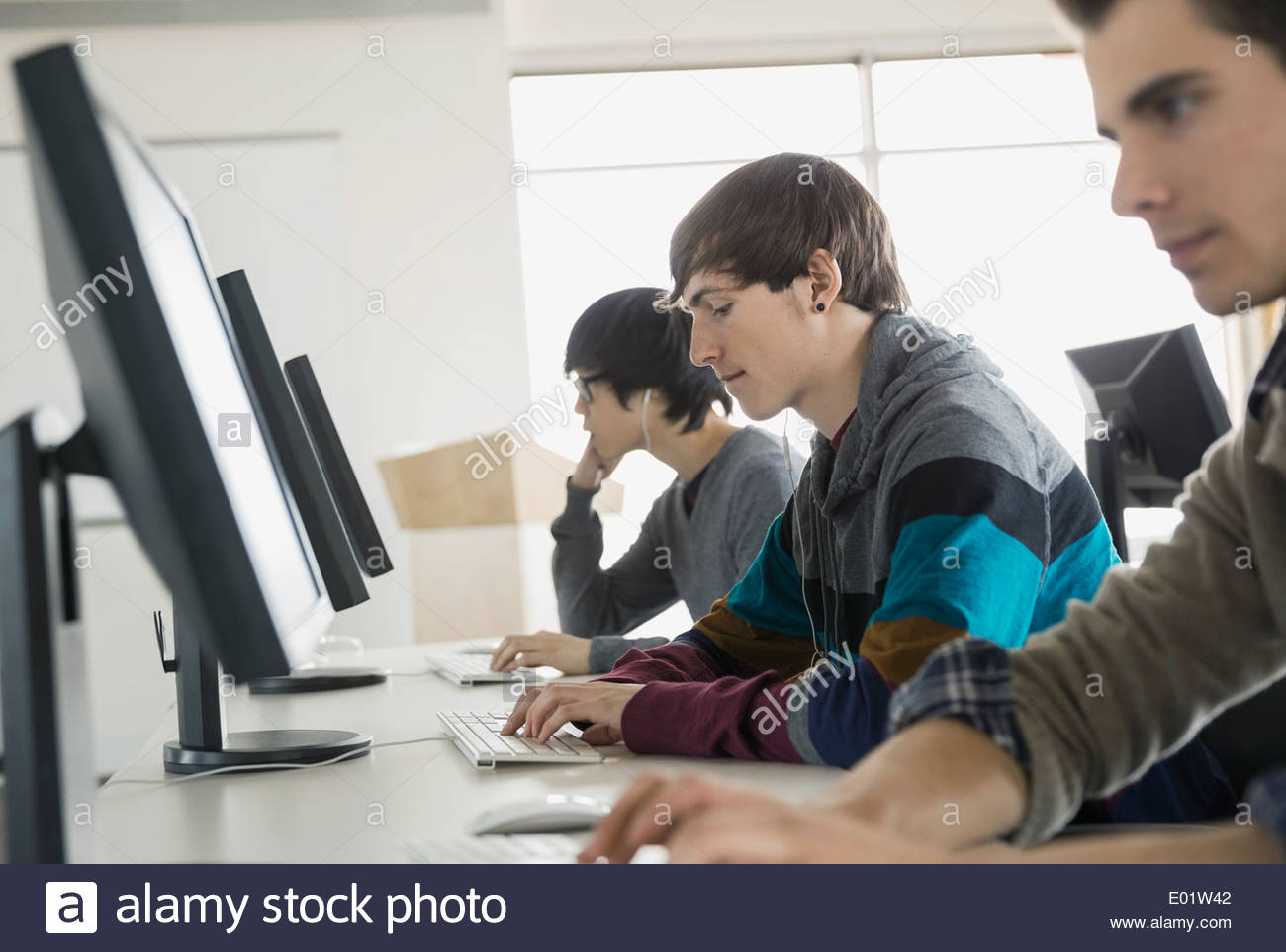 Students computer typing hi-res stock photography and images - Alamy