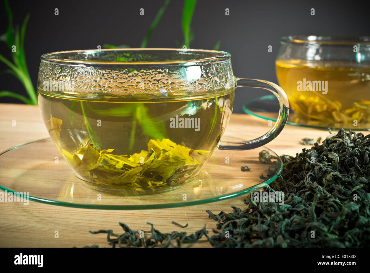 still life with green tea and loose tea Stock Photo - Alamy