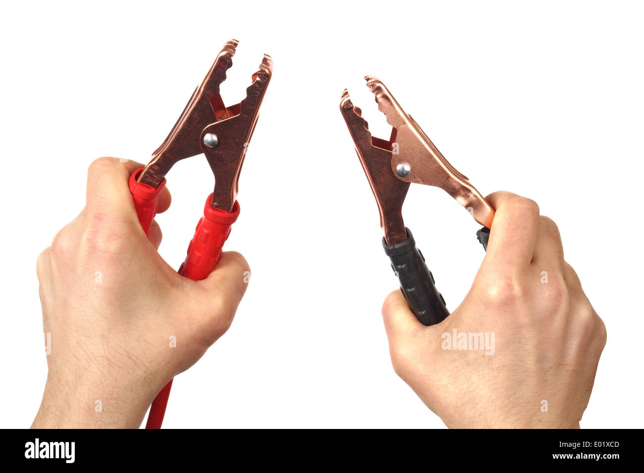 Hands with jumper cables on white Stock Photo - Alamy