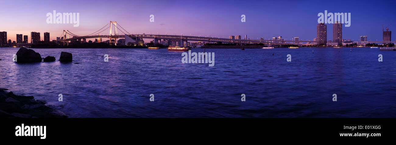 Colorful panoramic sunset scenery of the Rainbow bridge at sunset ...