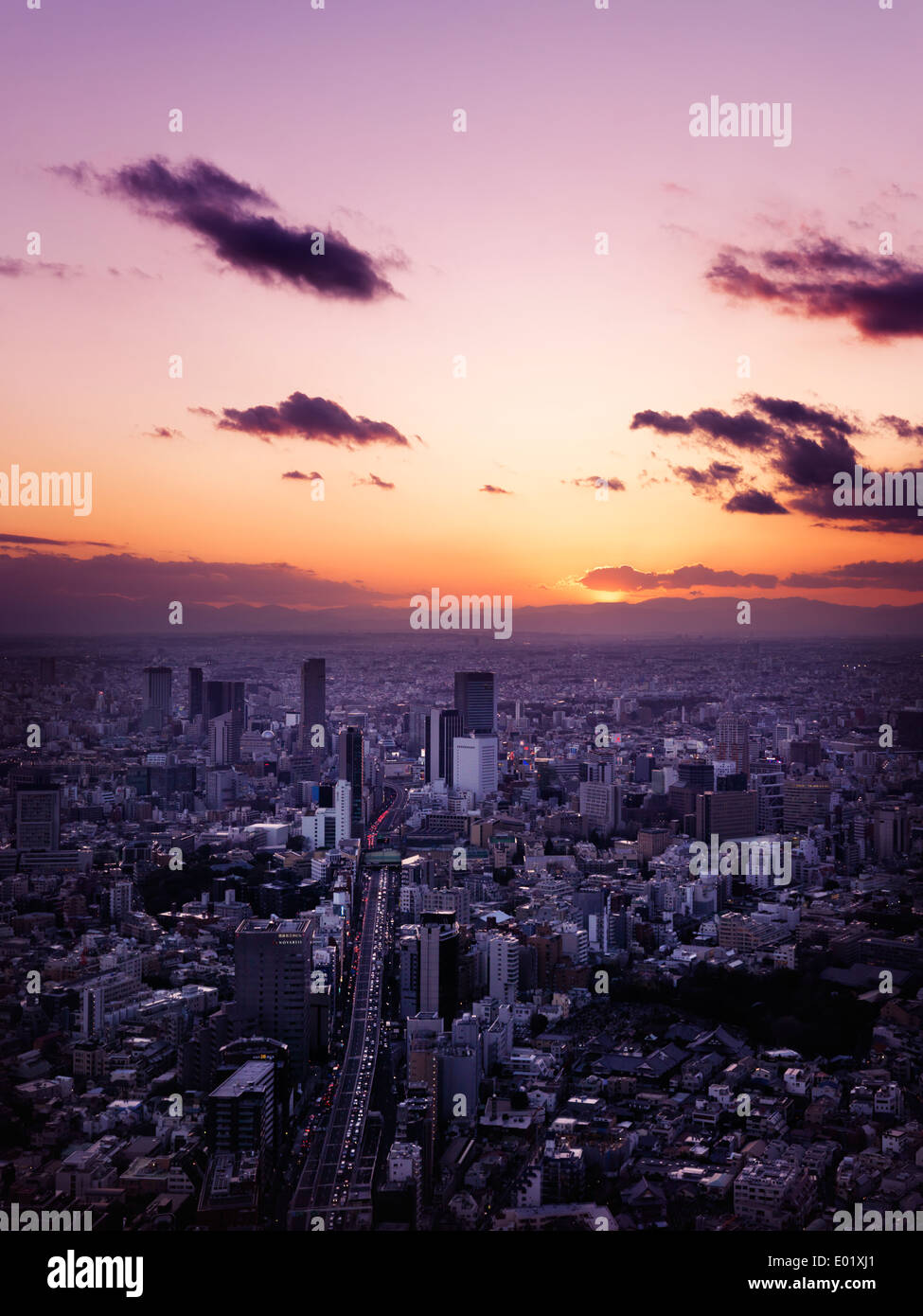 Beautiful dramatic sunset scenery of Tokyo city landscape lit with red ...