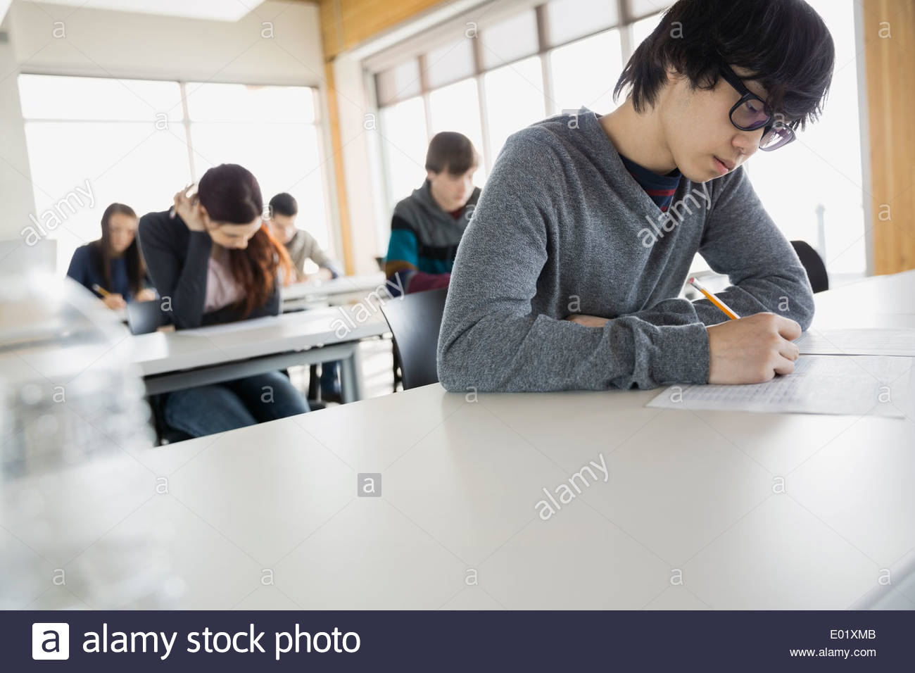 Students writing test hi-res stock photography and images - Alamy