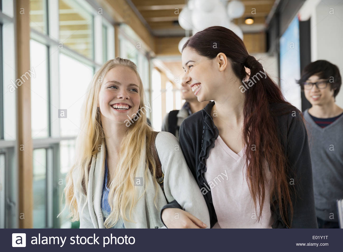 Laughing school girls hi-res stock photography and images - Alamy