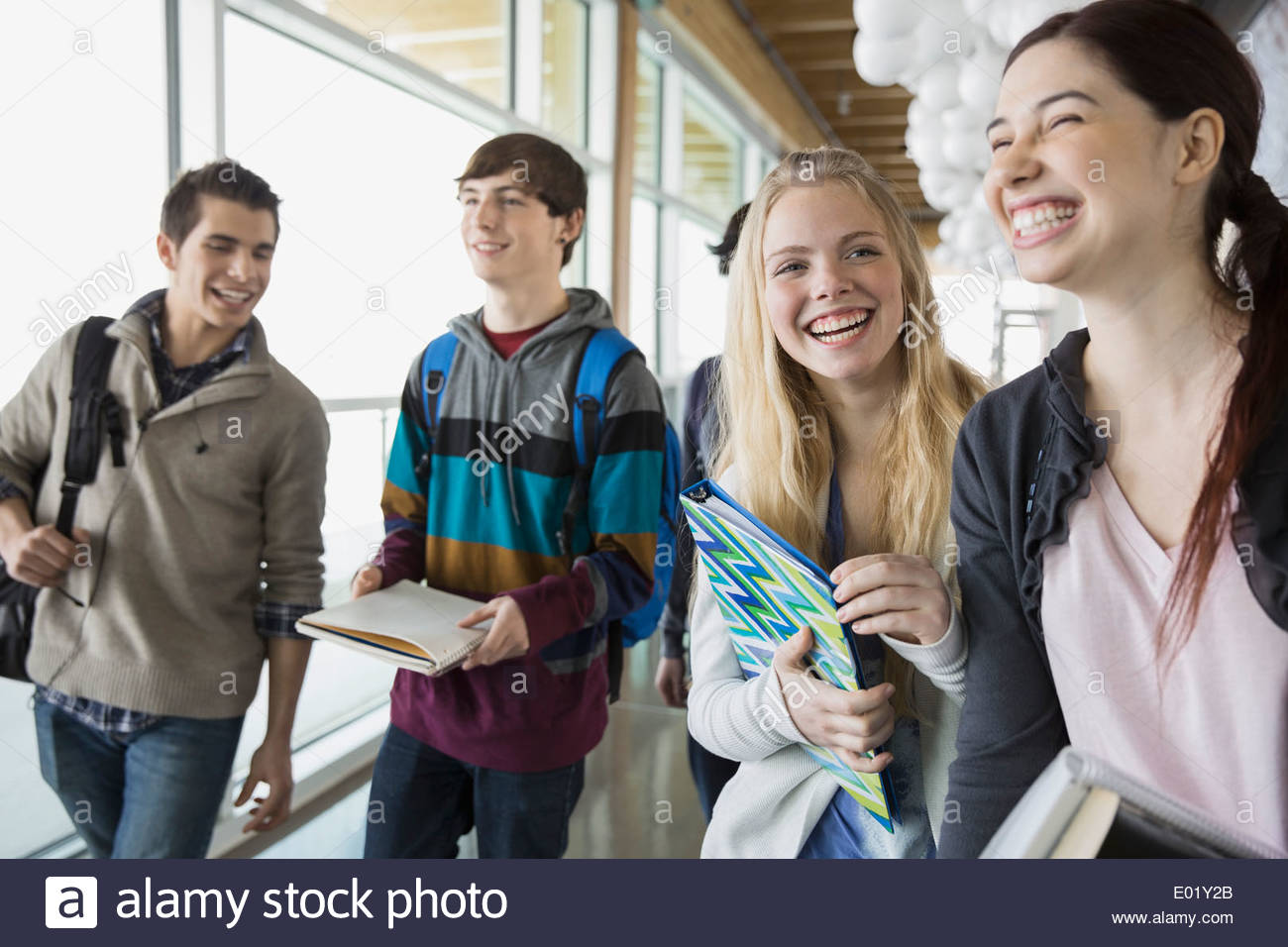 Laughing school girls hi-res stock photography and images - Alamy