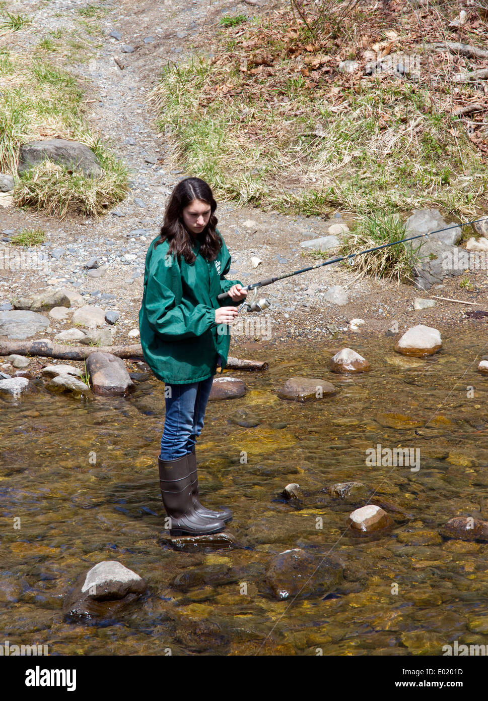 Woman wading in river hi-res stock photography and images - Alamy