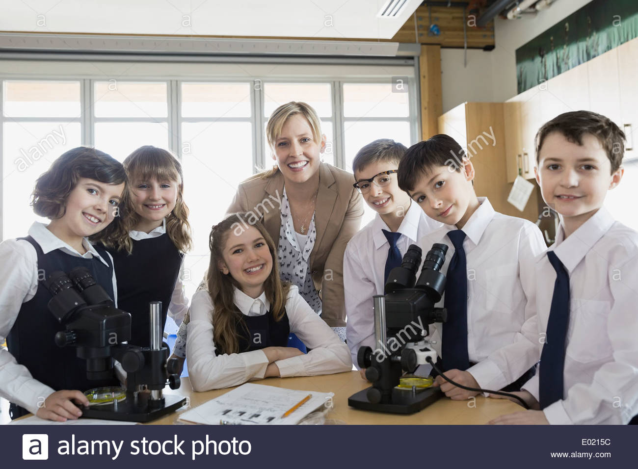 Adult posing school uniform classroom hi-res stock photography and ...