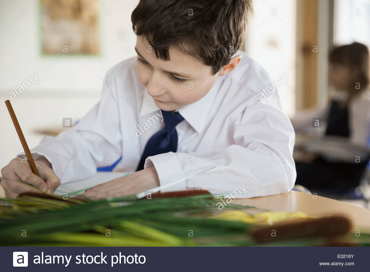 Homework school uniform hi-res stock photography and images - Alamy