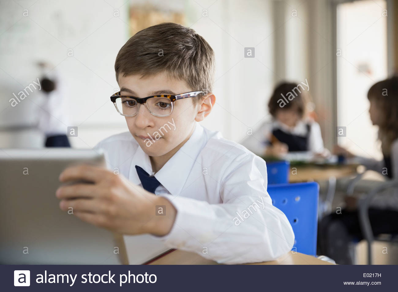 School boy tablet desk hi-res stock photography and images - Alamy