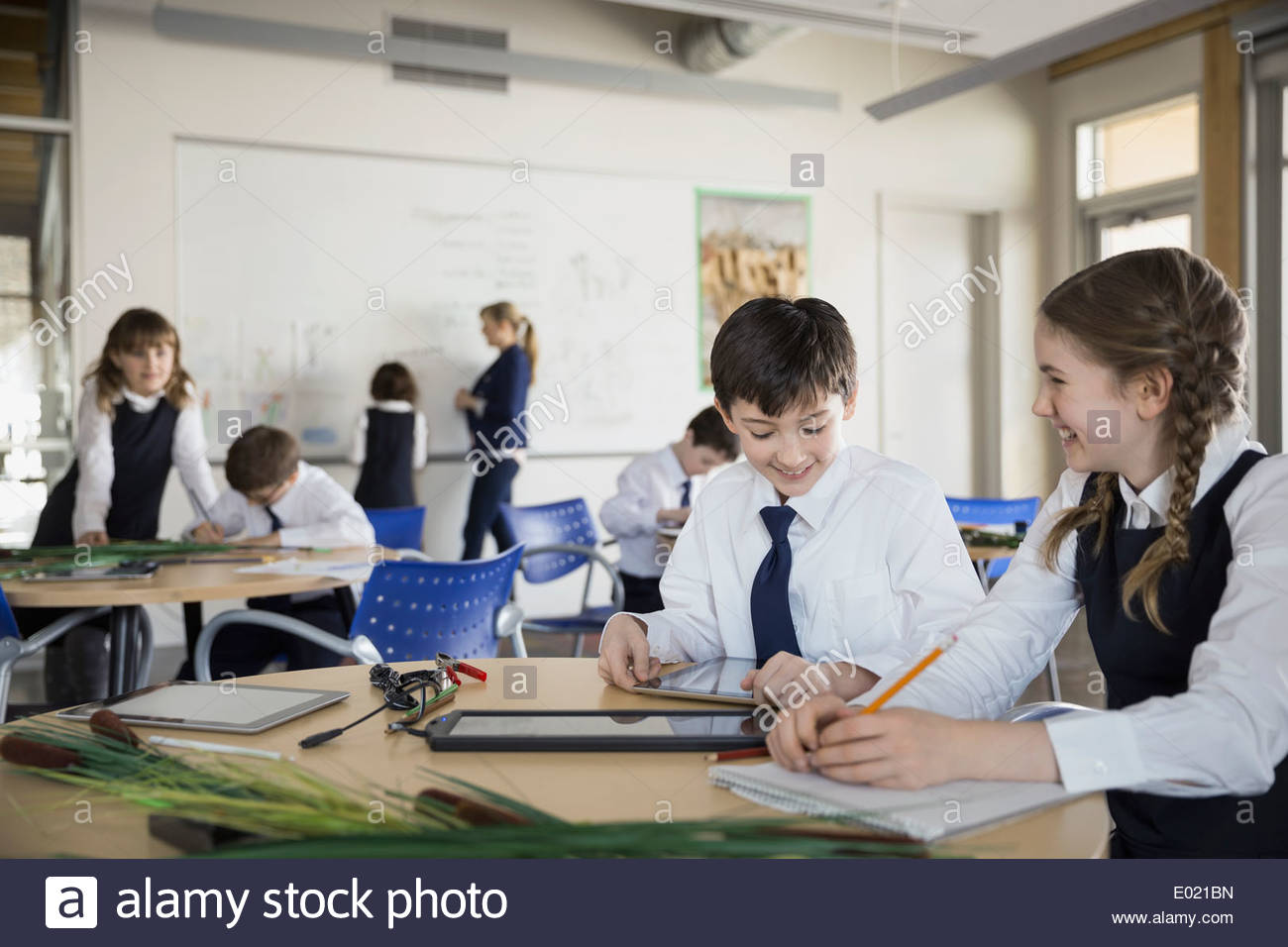 Students working together in classroom hi-res stock photography and ...