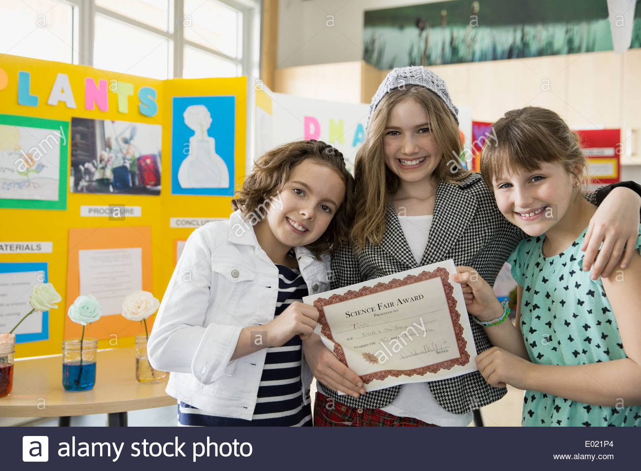School girls with award at science fair Stock Photo - Alamy