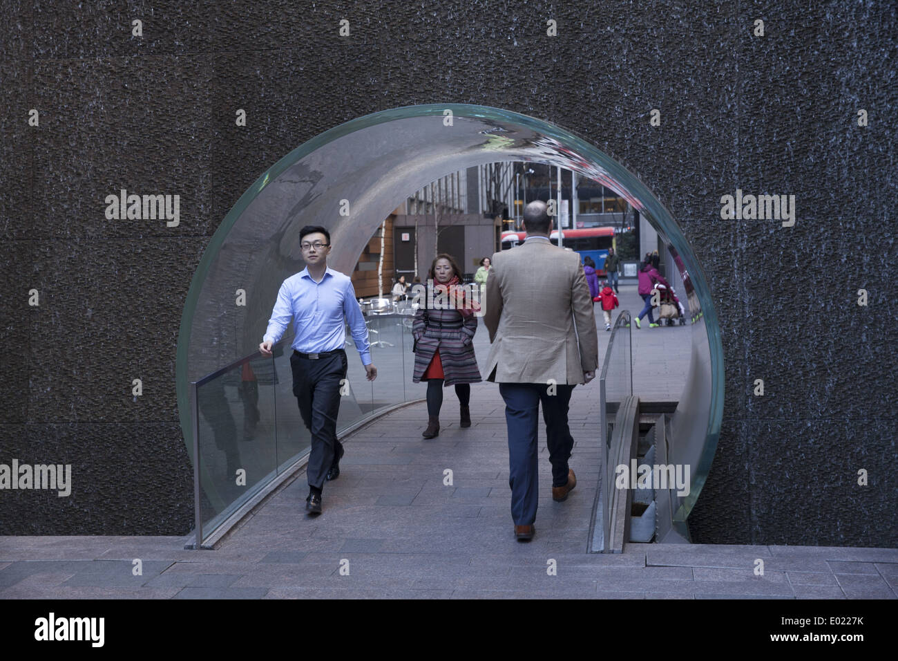 People walk through the pedestrian tunnel between W. 49th & W. 48th ...