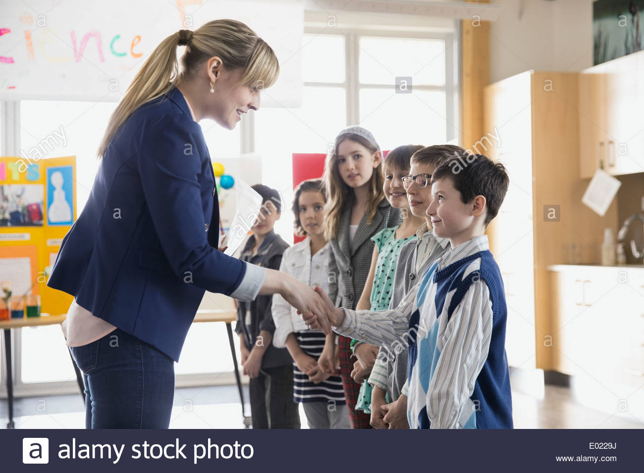 Handshake adult school child hi-res stock photography and images - Alamy