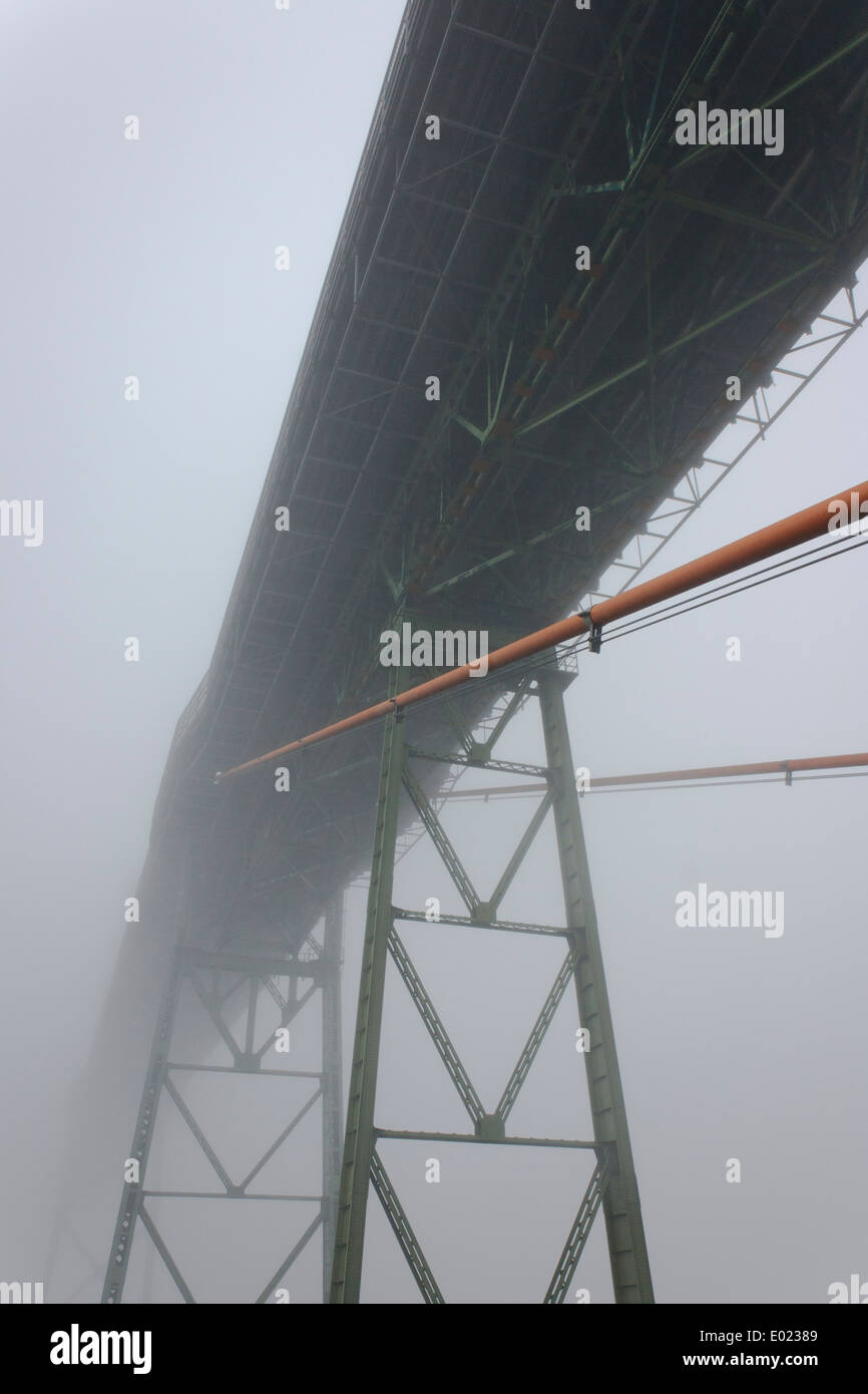 From below view of traffic bridge in the mist Stock Photo - Alamy