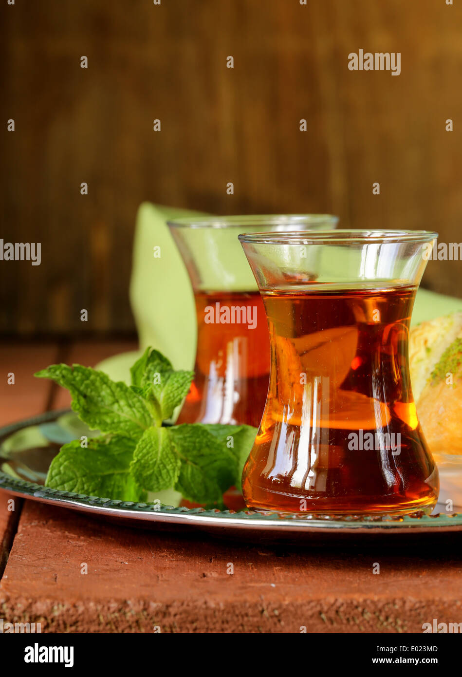 traditional Arabic Turkish tea served with fresh mint Stock Photo - Alamy
